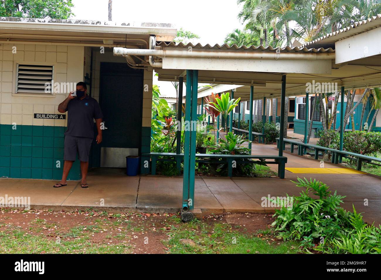 Principal Keoki Fraser stands next to a classroom at Aikahi Elementary ...