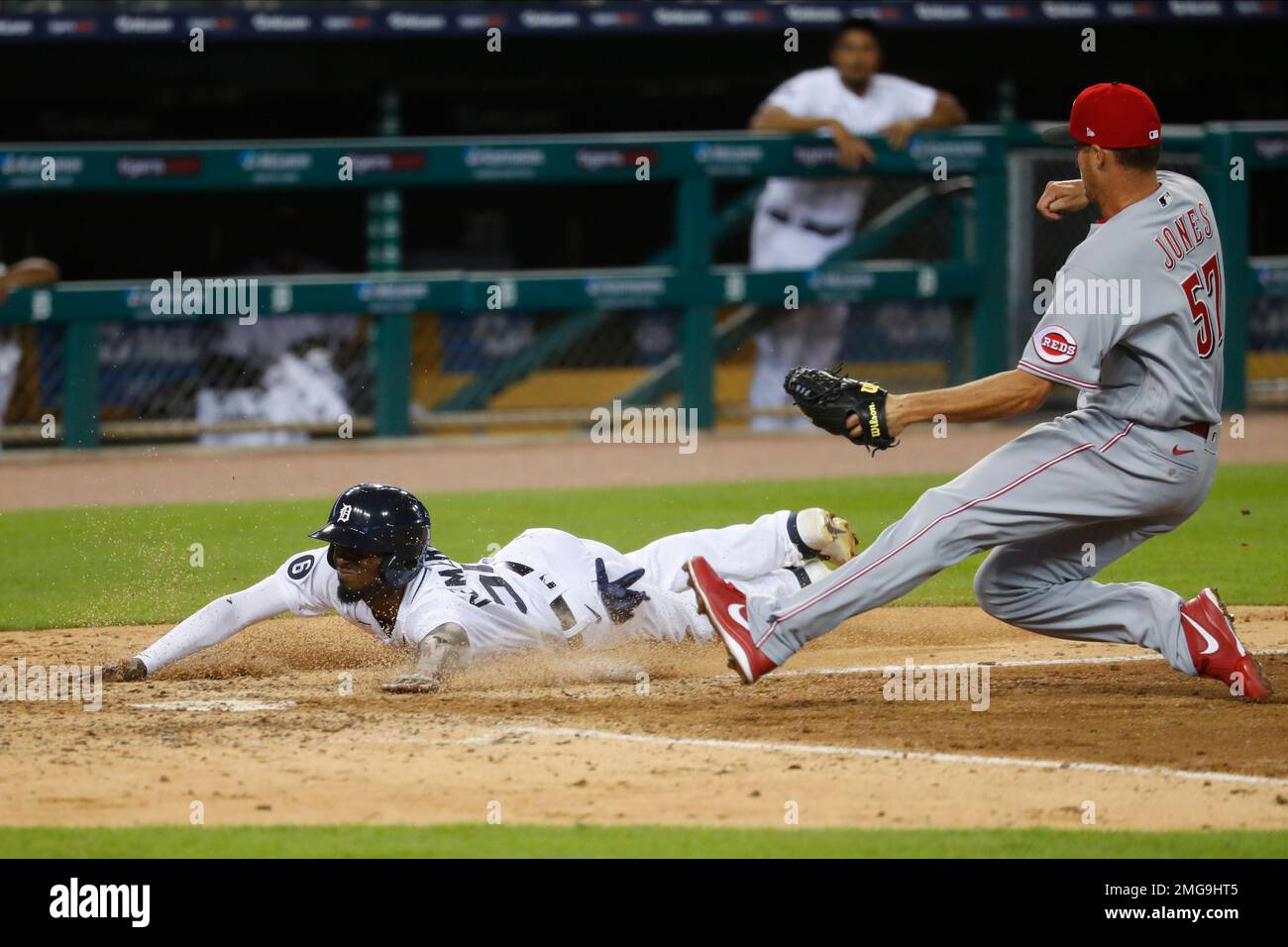 Detroit Tigers' Travis Demeritte beats the tag of Cincinnati Reds ...
