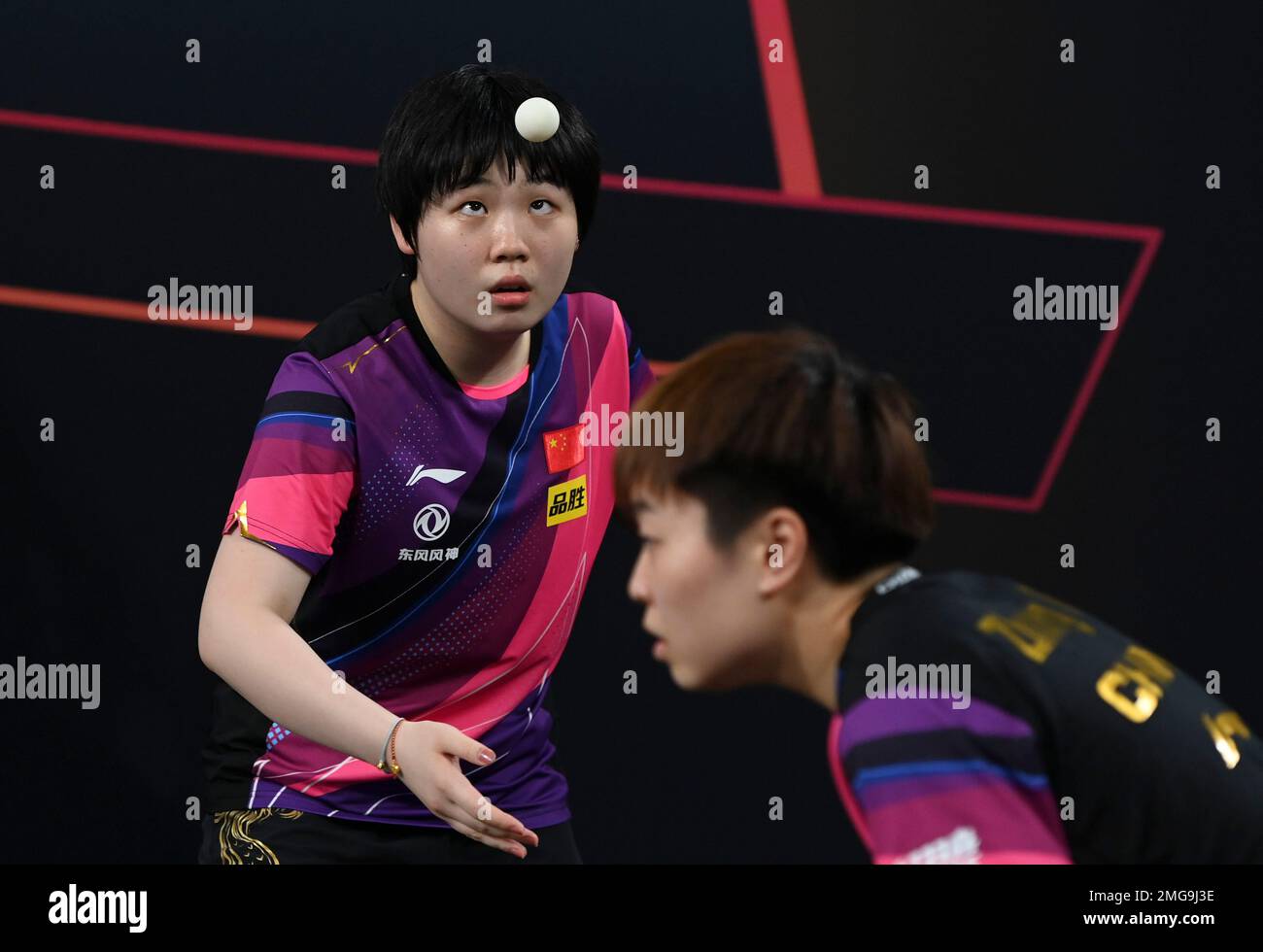 Doha, Qatar. 25th Jan, 2023. Kuai Man (L)/Zhang Rui of China compete ...