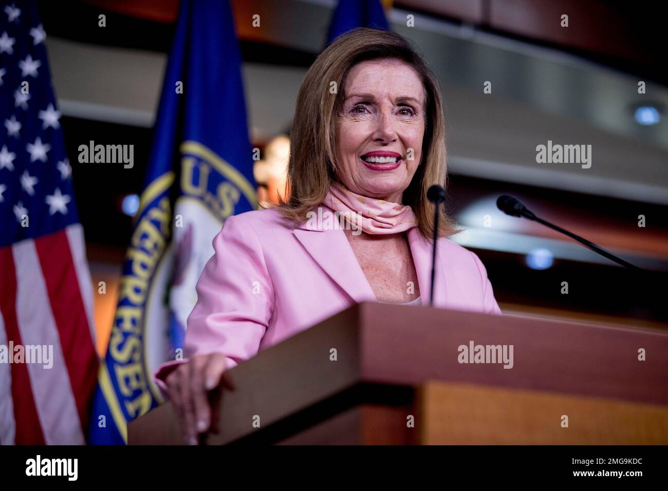House Speaker Nancy Pelosi of Calif. smiles while speaking at a news ...