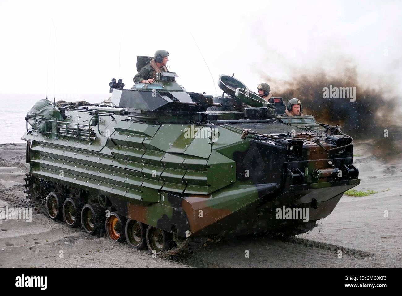 FILE - U.S. Marines from the 3rd Marine Expeditionary Brigade ride on ...