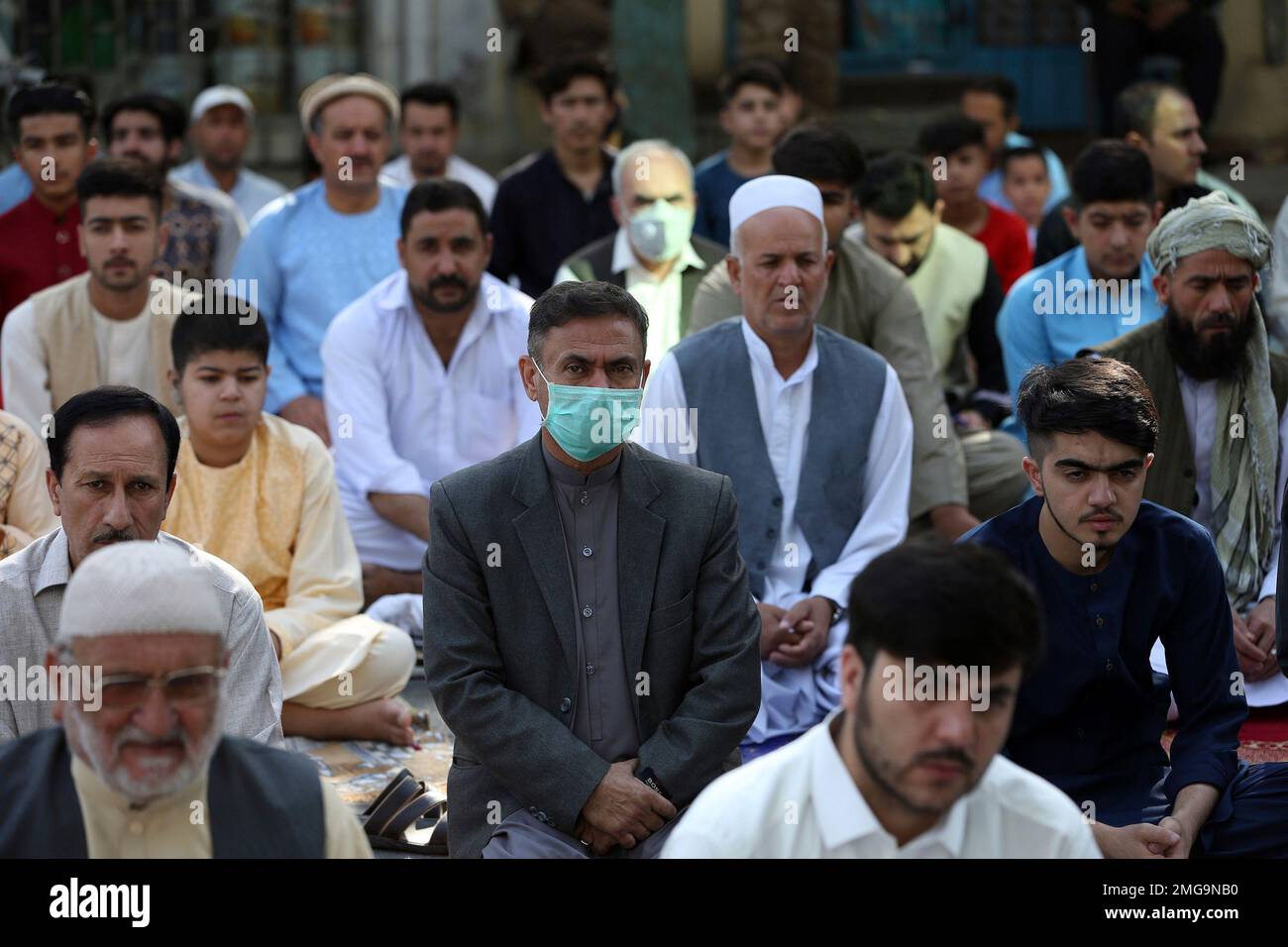 Afghan Muslims offer Eid al-Adha prayers in Kabul, Afghanistan, Friday ...