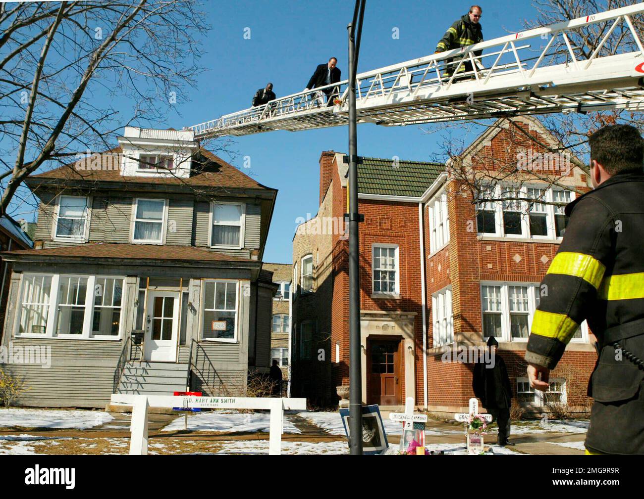 FILE - In this March 11, 2005, file photo, Chicago police and fire ...