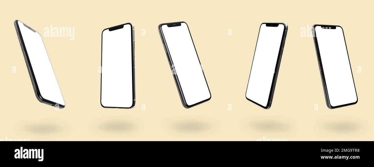 Set of mobile phones with blank screens on beige background Stock Photo ...