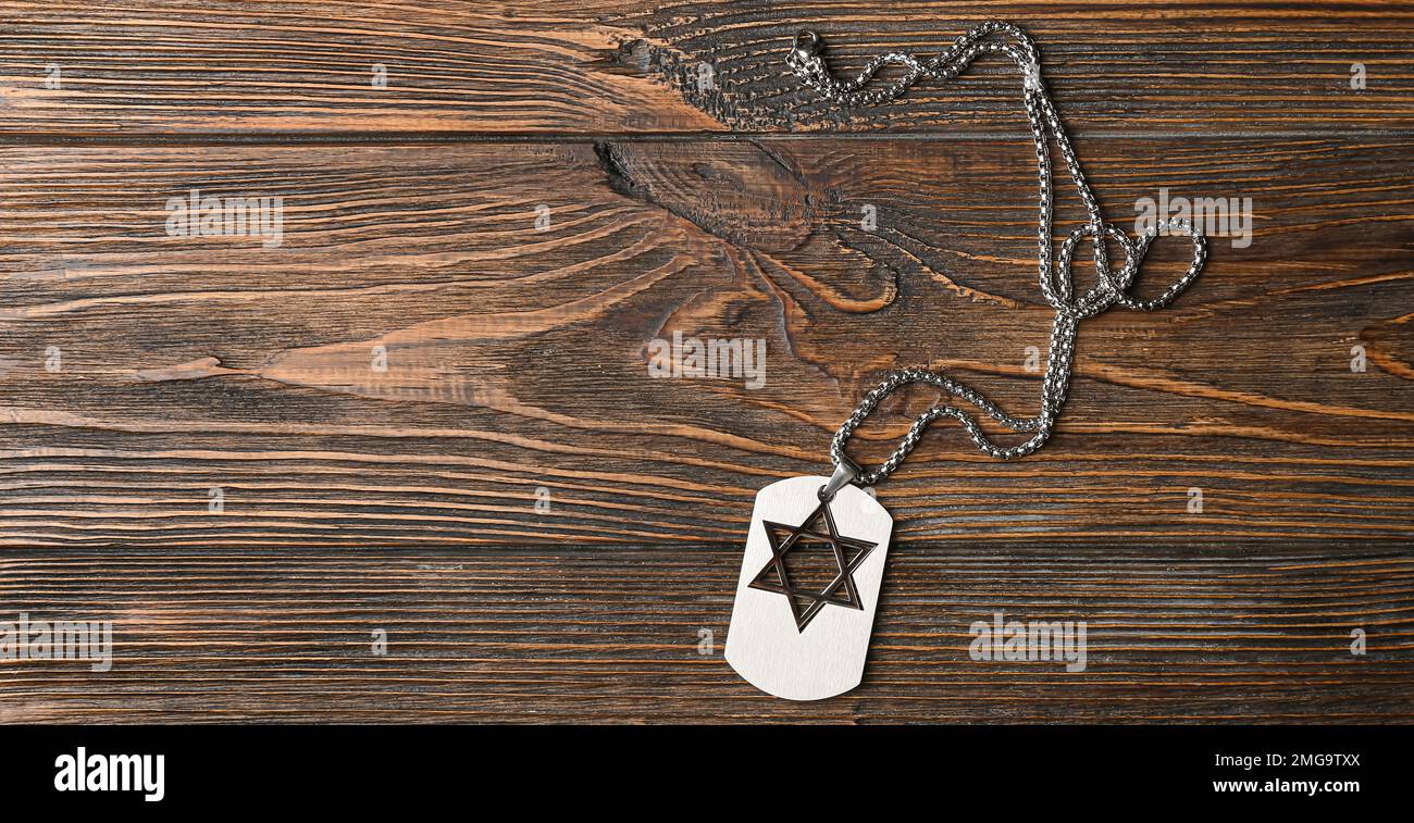 Military tag of Israeli soldier on wooden background with space for ...