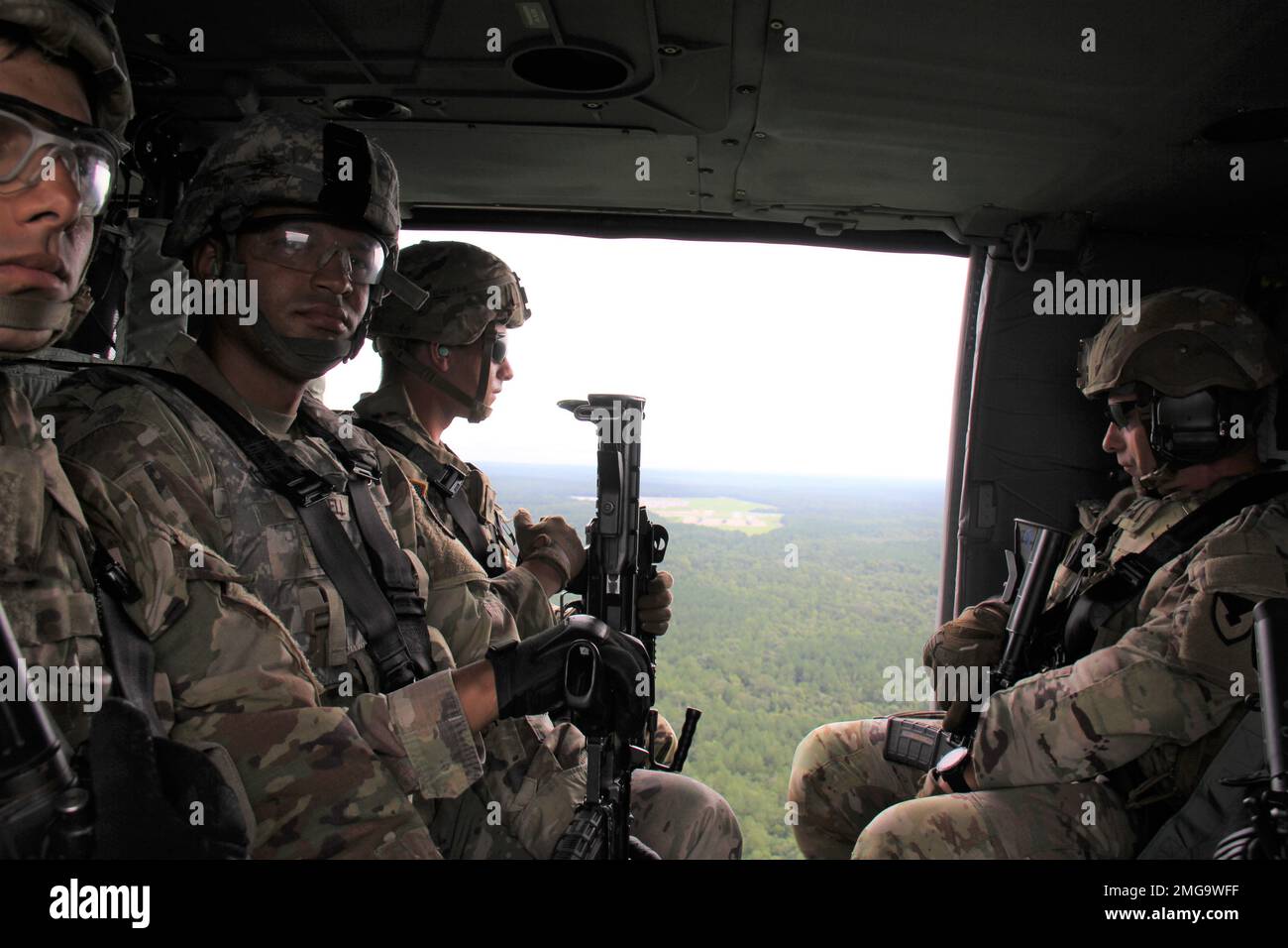 Army Materiel Command’s Best Squad flies to a training area aboard a UH ...
