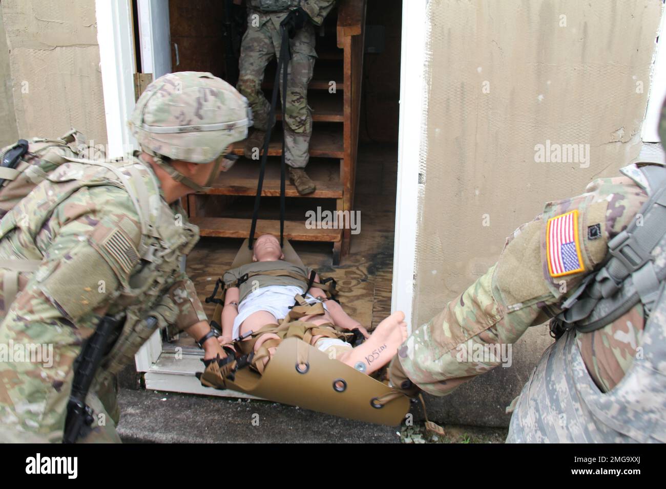SPC Matthew Ruiz practices rescuing an injured Soldier at the Military ...