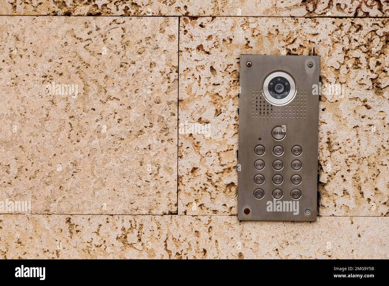 Security camera on stone wall hi-res stock photography and images - Alamy