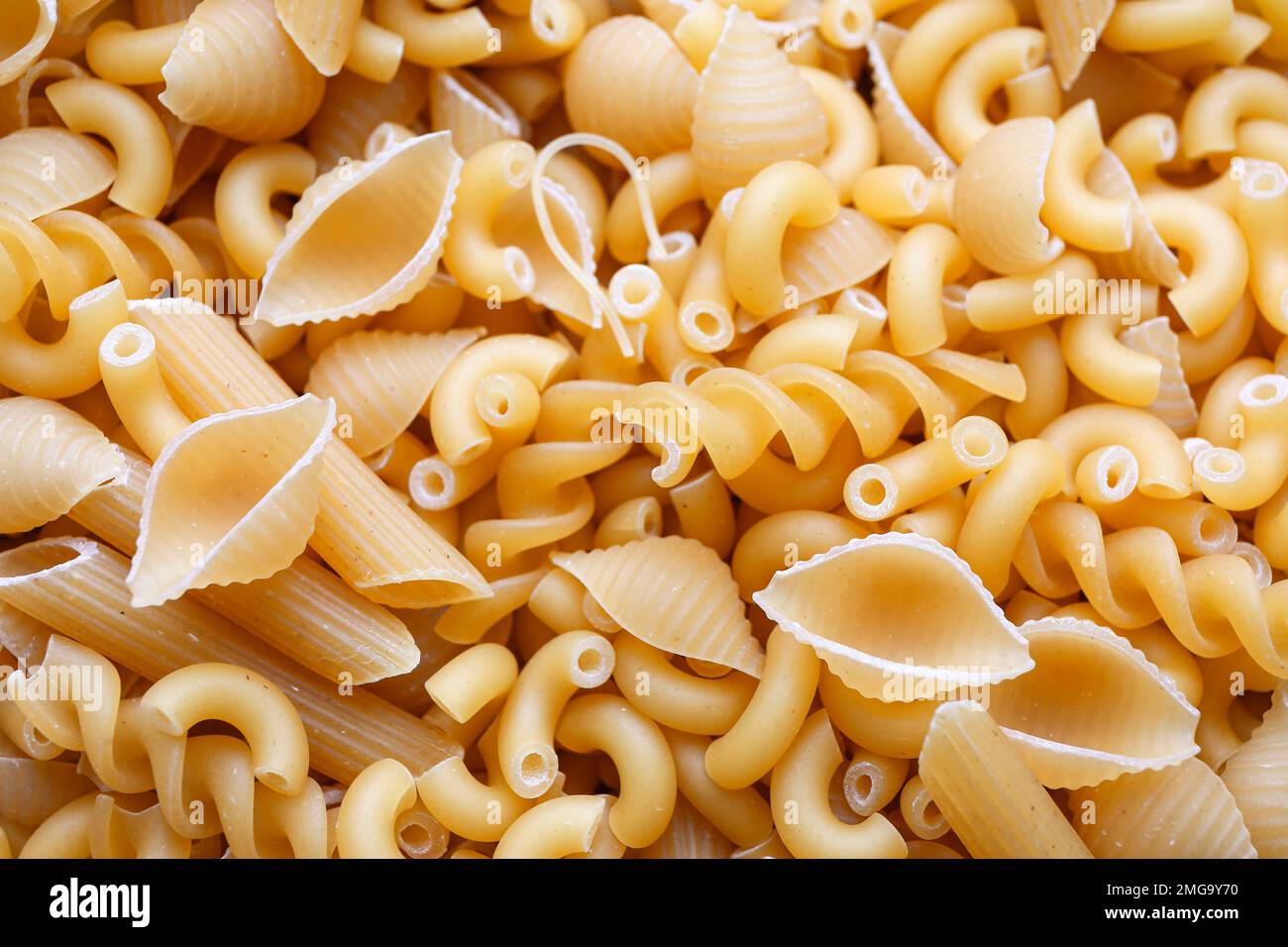 Different types of raw pasta, closeup Stock Photo - Alamy