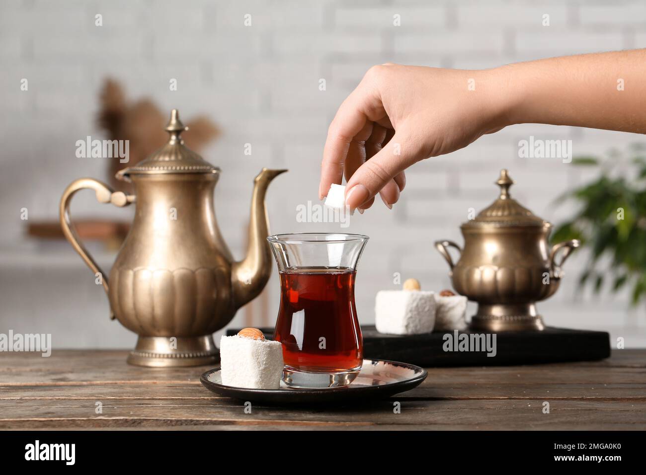 Putting sugar hi-res stock photography and images - Alamy