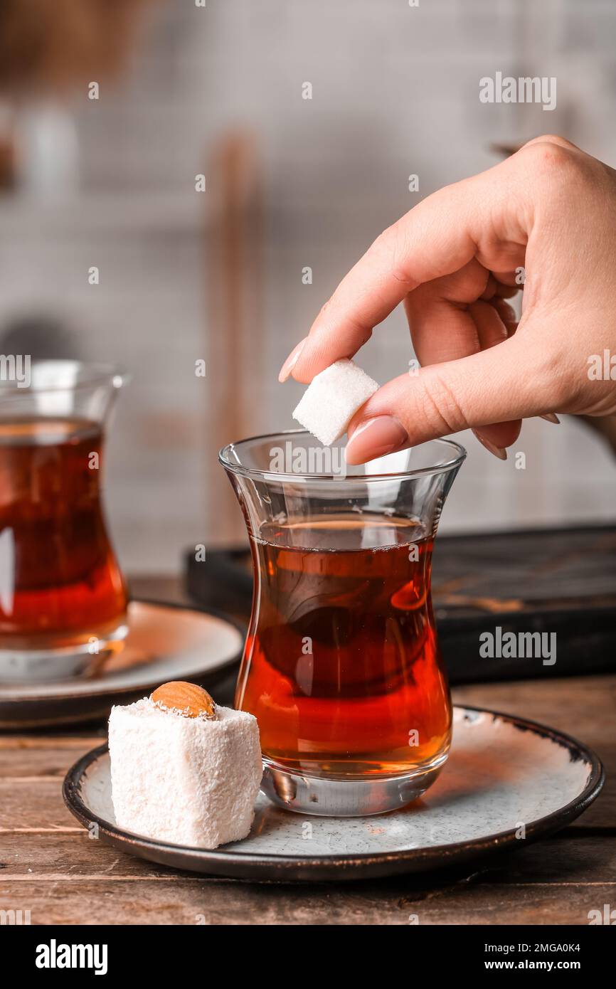 Putting sugar hi-res stock photography and images - Alamy