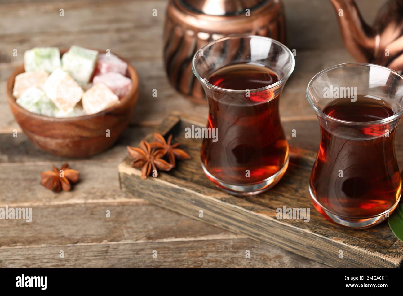 Board with cups of Turkish tea on wooden background, closeup Stock ...