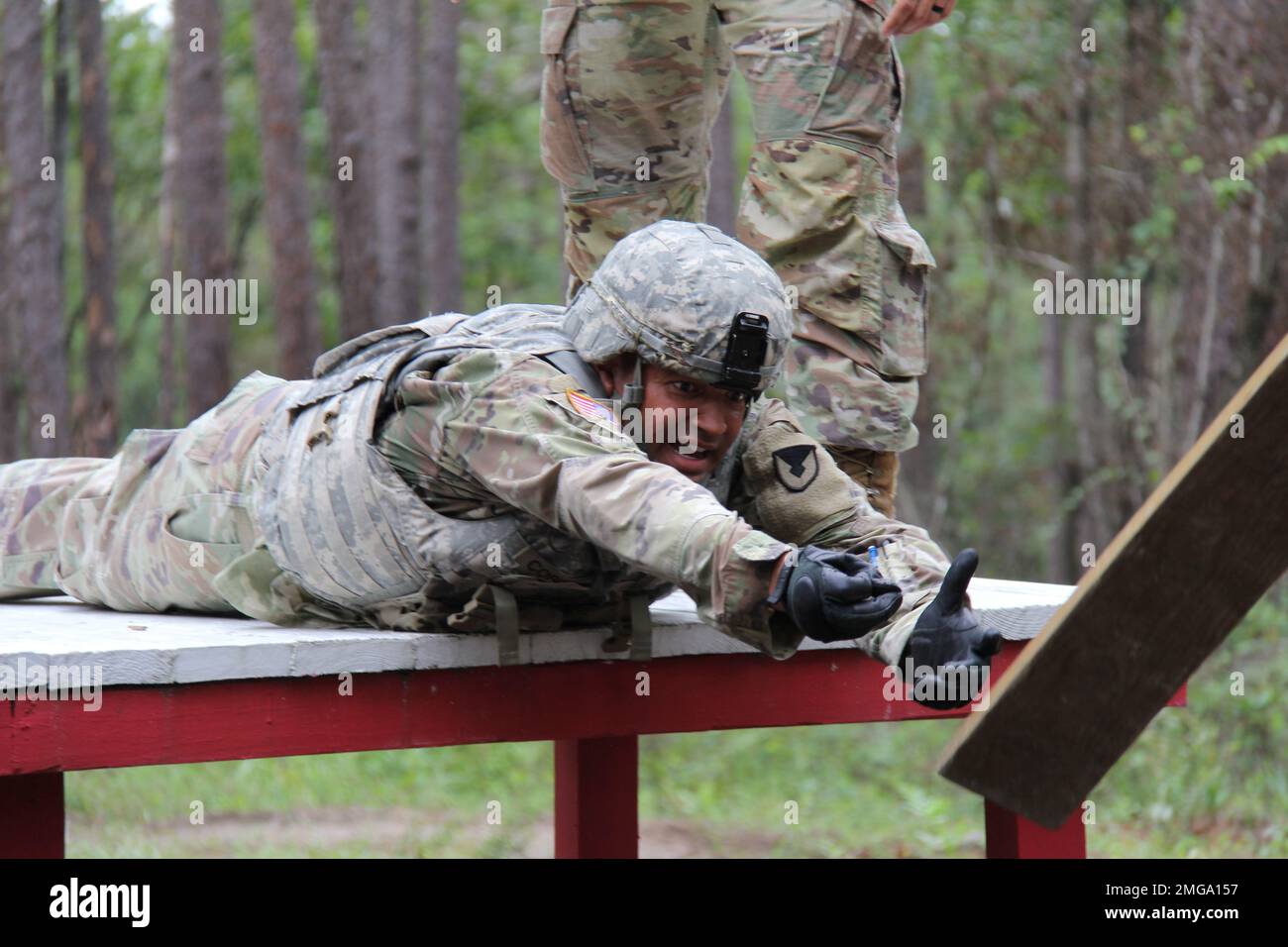 SSG Robert Cordell navigates an obstacle at the leadership reaction ...