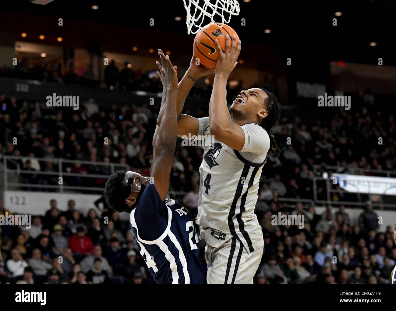 Providence's Corey Floyd, Jr. (14) fails on a layup blocked by Butler's ...