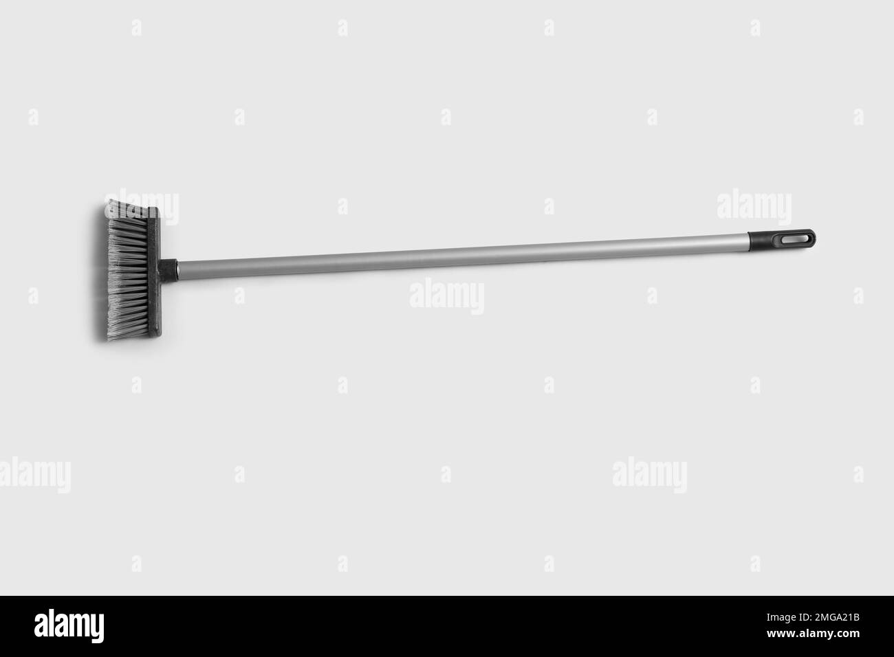Sweeping broom on white background Stock Photo - Alamy