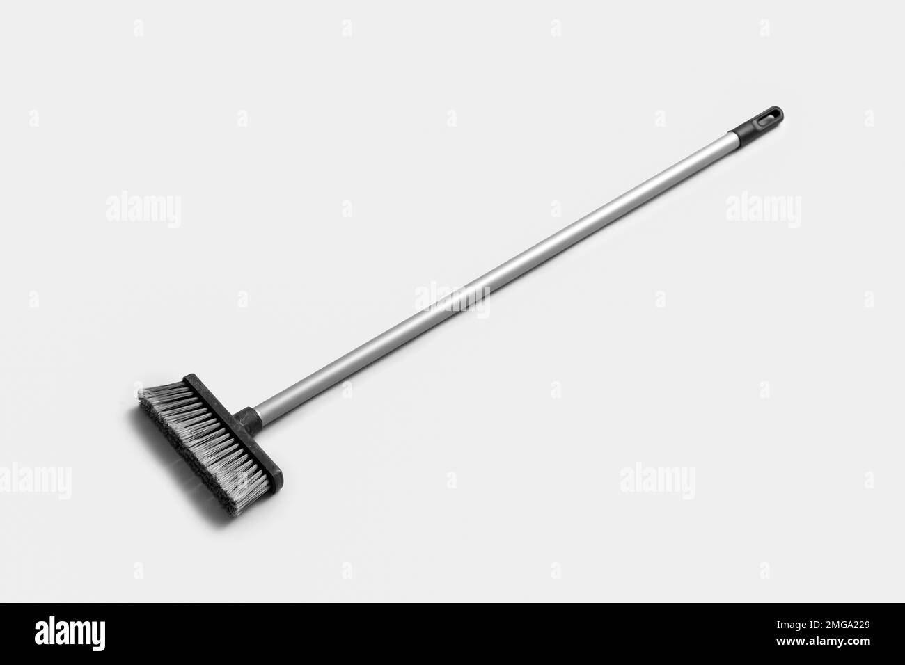 Sweeping broom on white background Stock Photo - Alamy