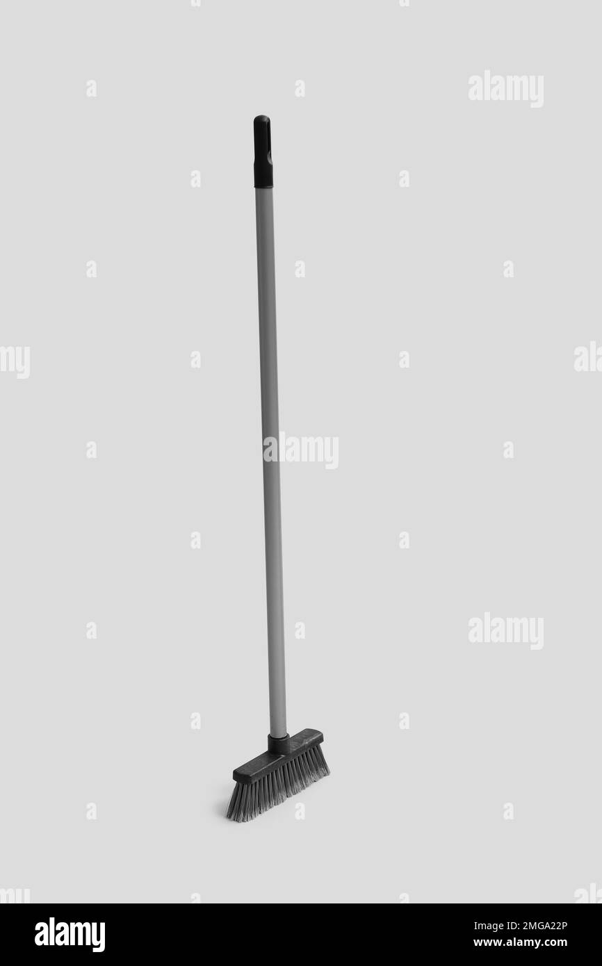 Sweeping broom on white background Stock Photo - Alamy