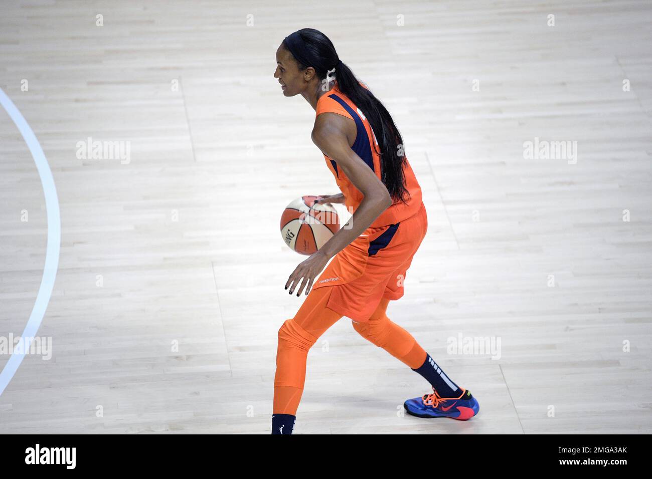 Connecticut Sun forward DeWanna Bonner (24) brings the ball up the ...