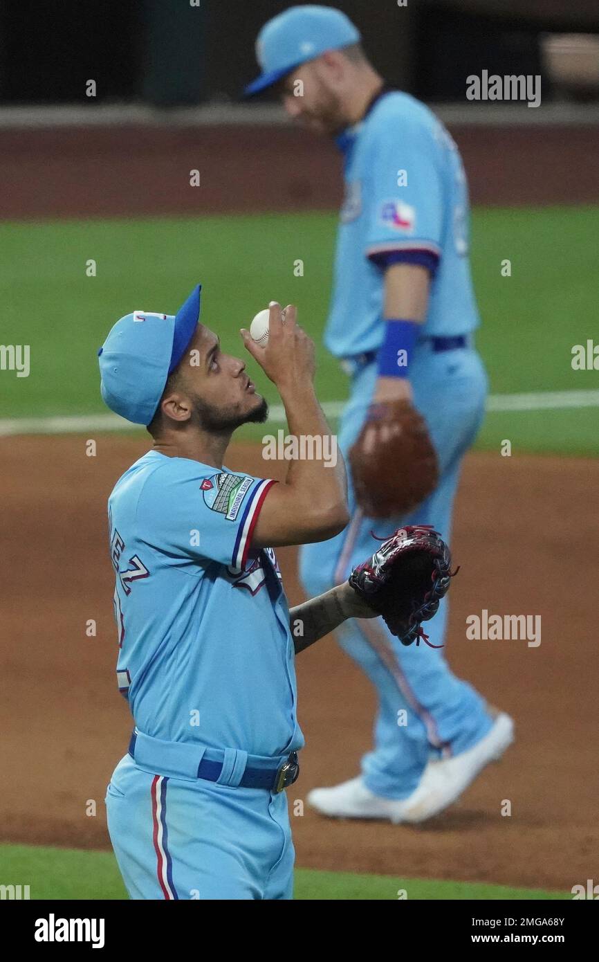 Texas Rangers relief pitcher Jonathan Hernandez gets ready to pitch ...