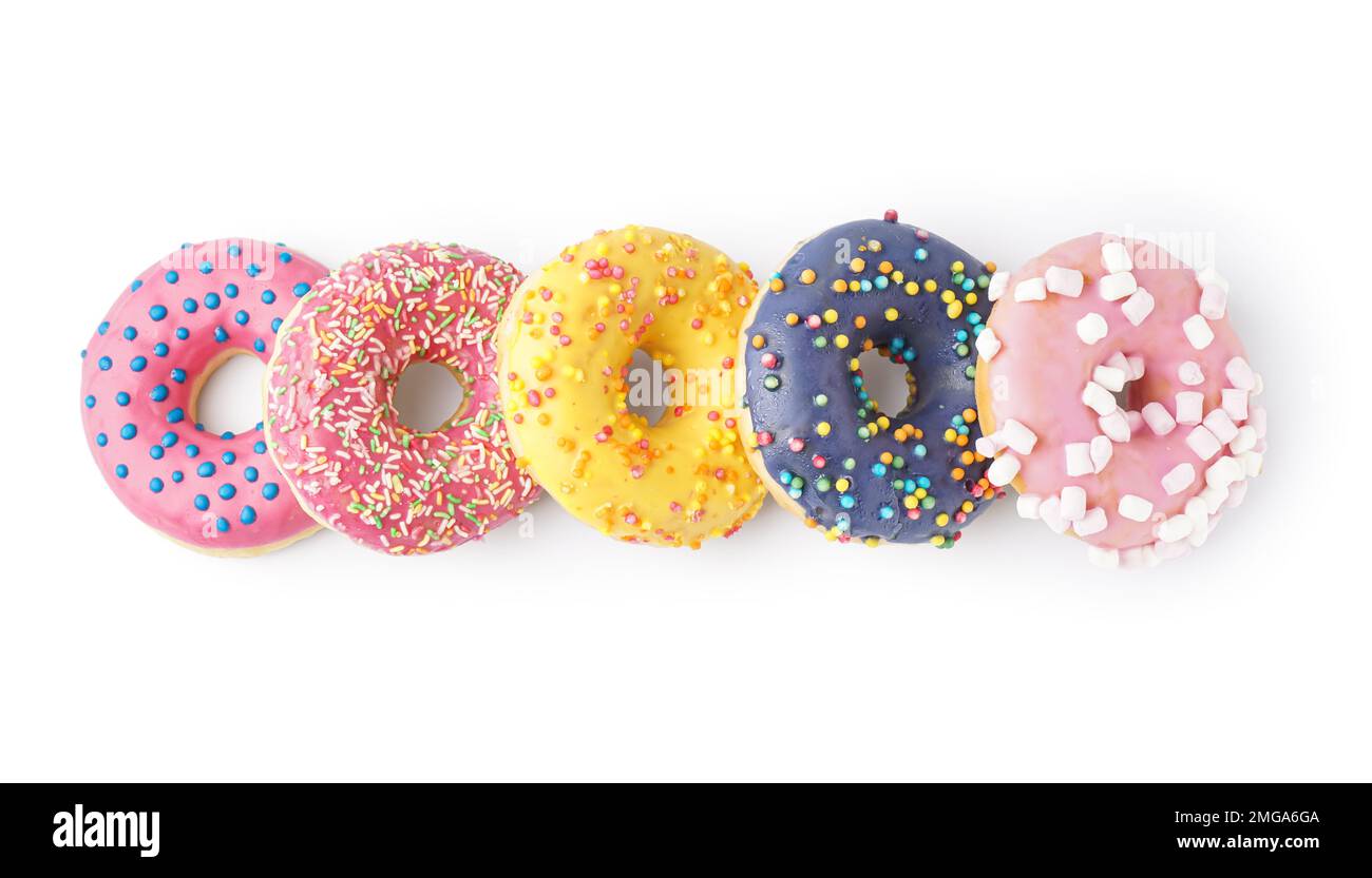 Row of sweet donuts on white background Stock Photo - Alamy