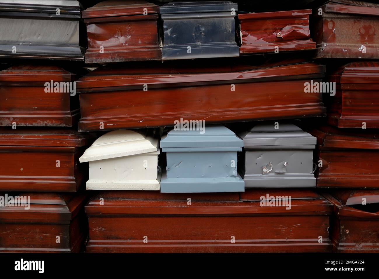 Discarded coffins, which were said to be from people who died of non ...