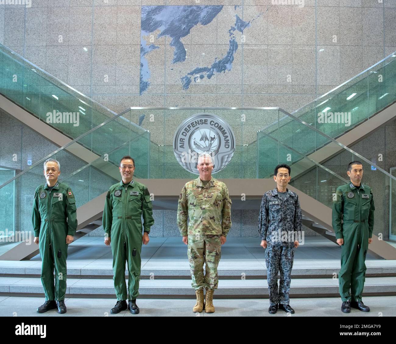 U.S. Air Force Lt. Gen. James Jacobson, Pacific Air Forces deputy commander, center, and Japan ...