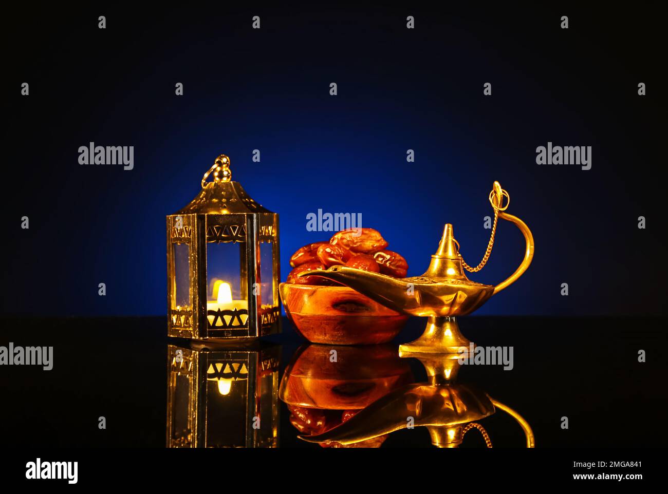 Aladdin lamp of wishes, dates and Muslim lantern for Ramadan on table ...