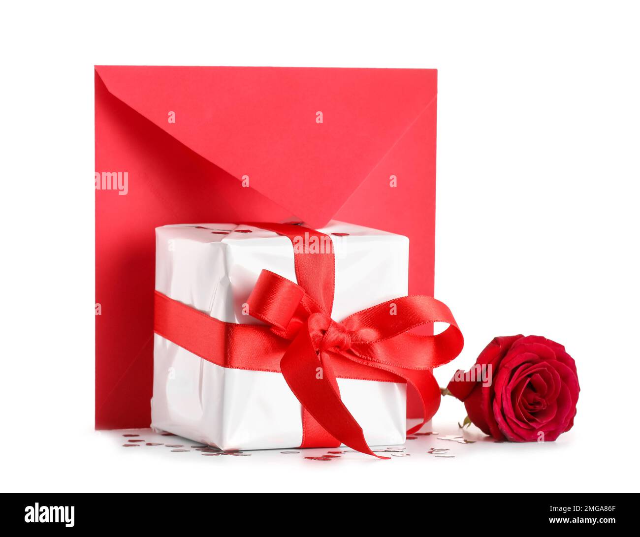 Gift box, envelope and rose flower isolated on white background ...