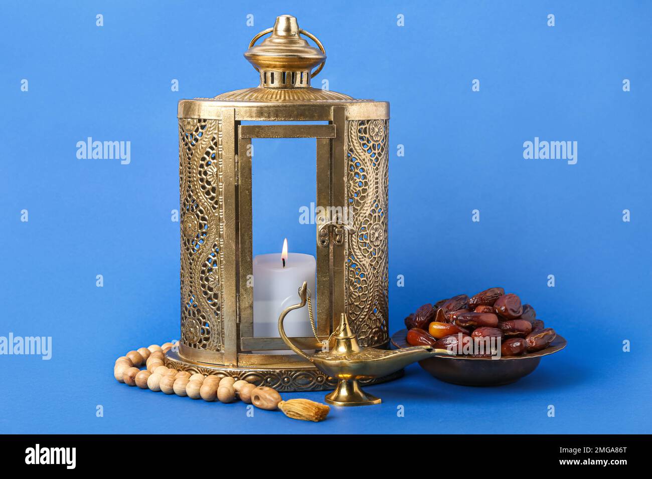 Aladdin lamp of wishes, dates, prayer beads and Muslim lantern for ...