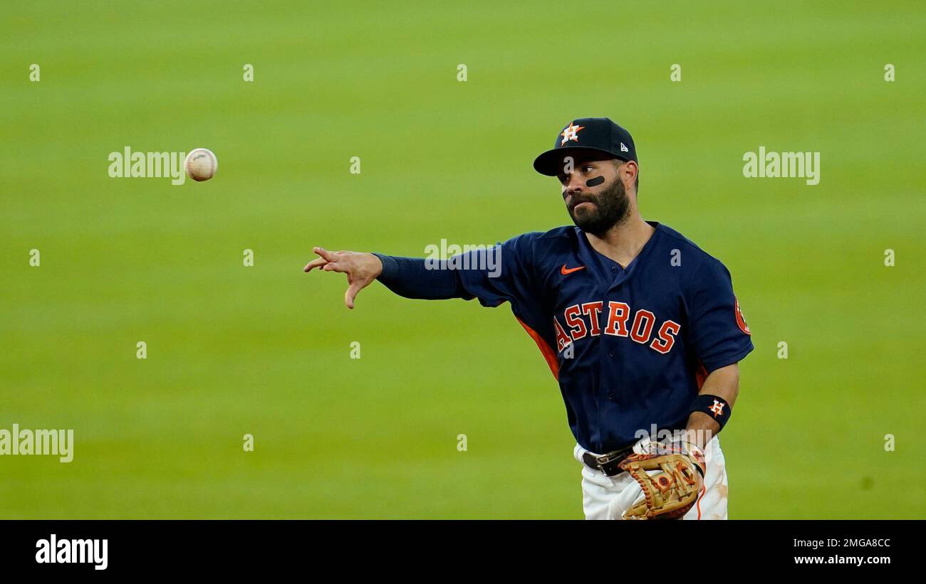 Houston Astros second baseman Jose Altuve throws to first after ...