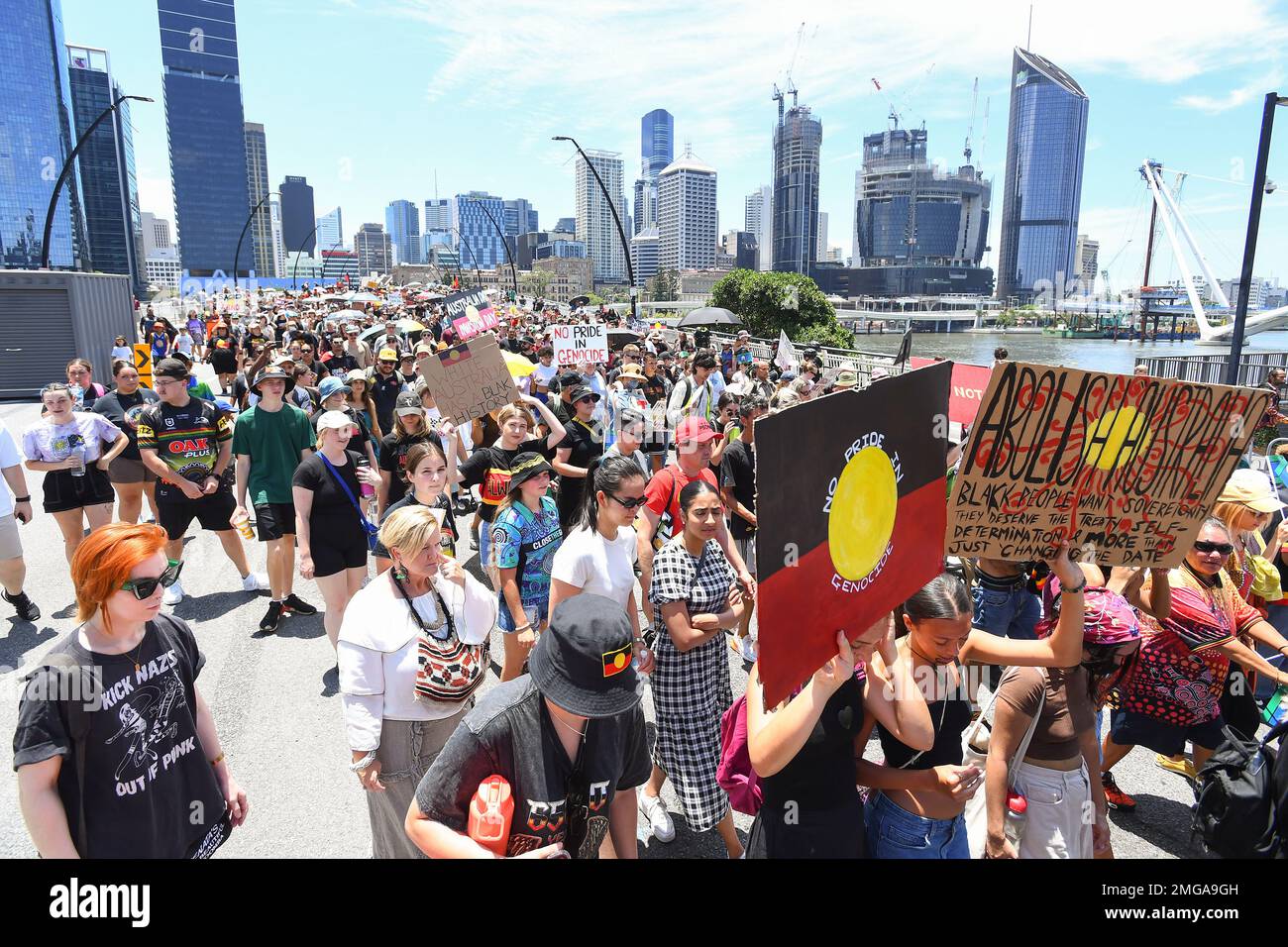 People march during an Invasion Day rally in Brisbane, Thursday ...