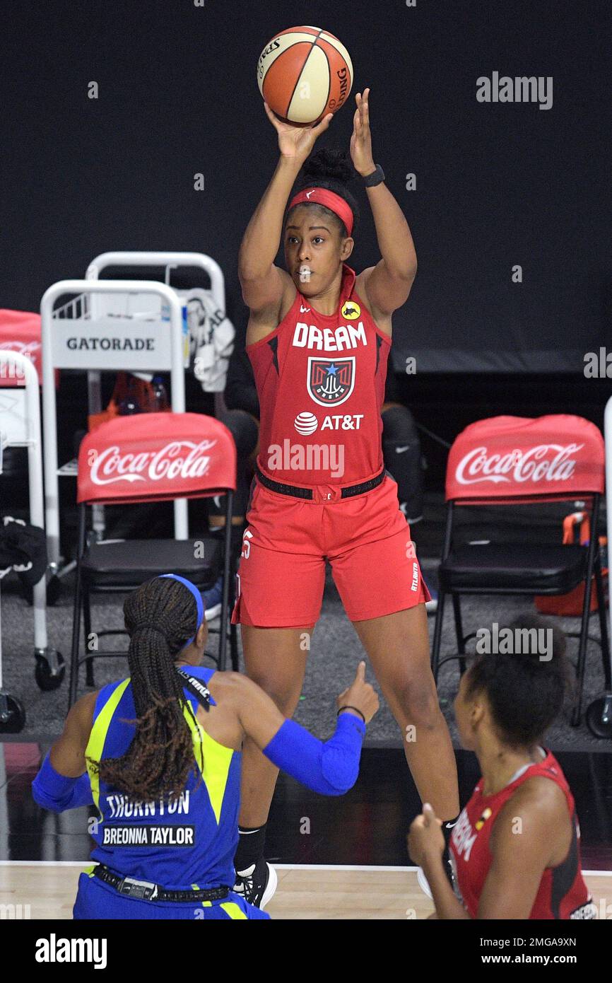 Atlanta Dream forward Monique Billings scores a 3-pointer in front of ...