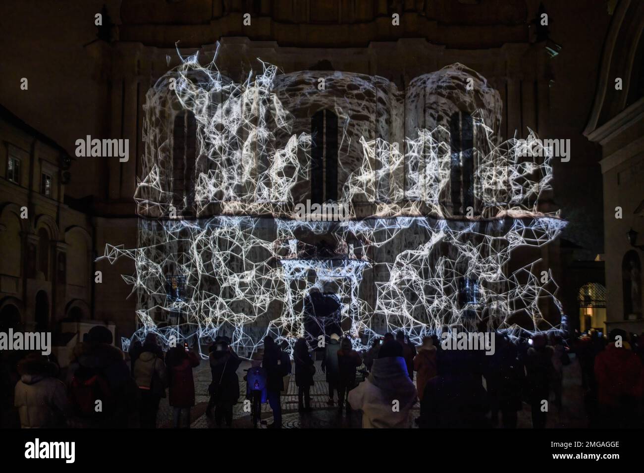 Vilnius, Lithuania. 25th Jan, 2023. People watch the light installation ...