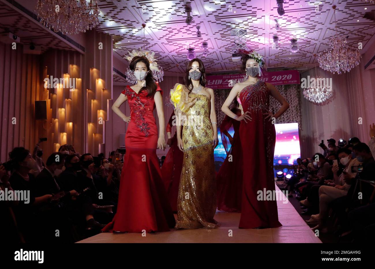 Models wearing face masks pose during a mask fashion show in Seoul ...