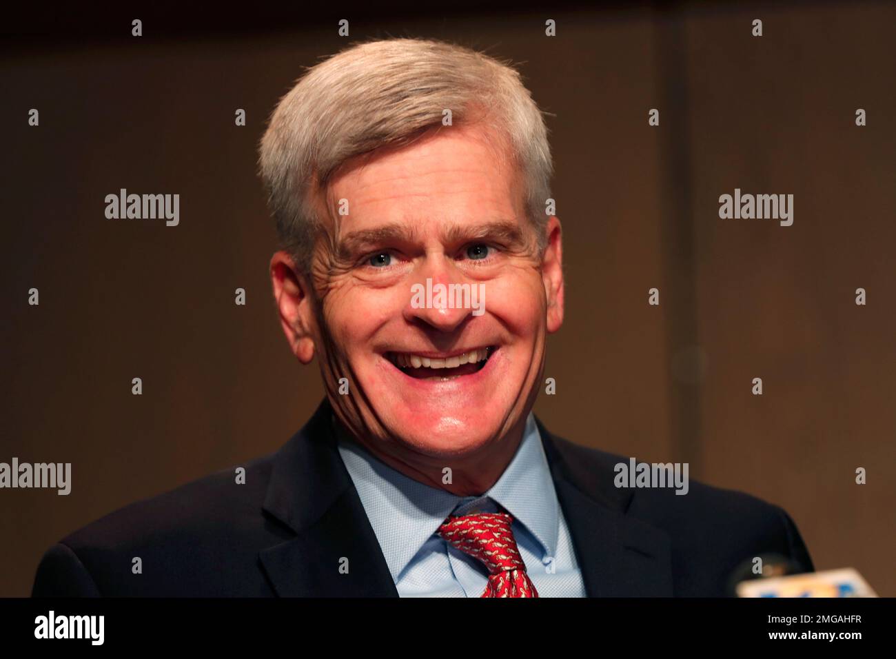 Sen. Bill Cassidy, R-La., delivers remarks to media after registering ...