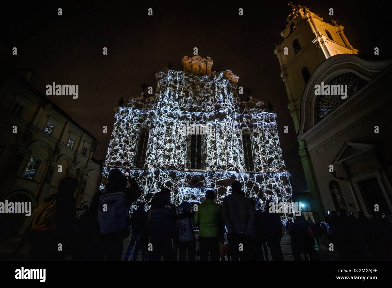 People watch the light installation 'Dialogues' by Video Architects at ...