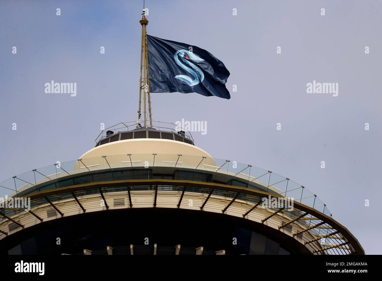 A flag with the new logo for the newly-named Seattle NHL team, the ...