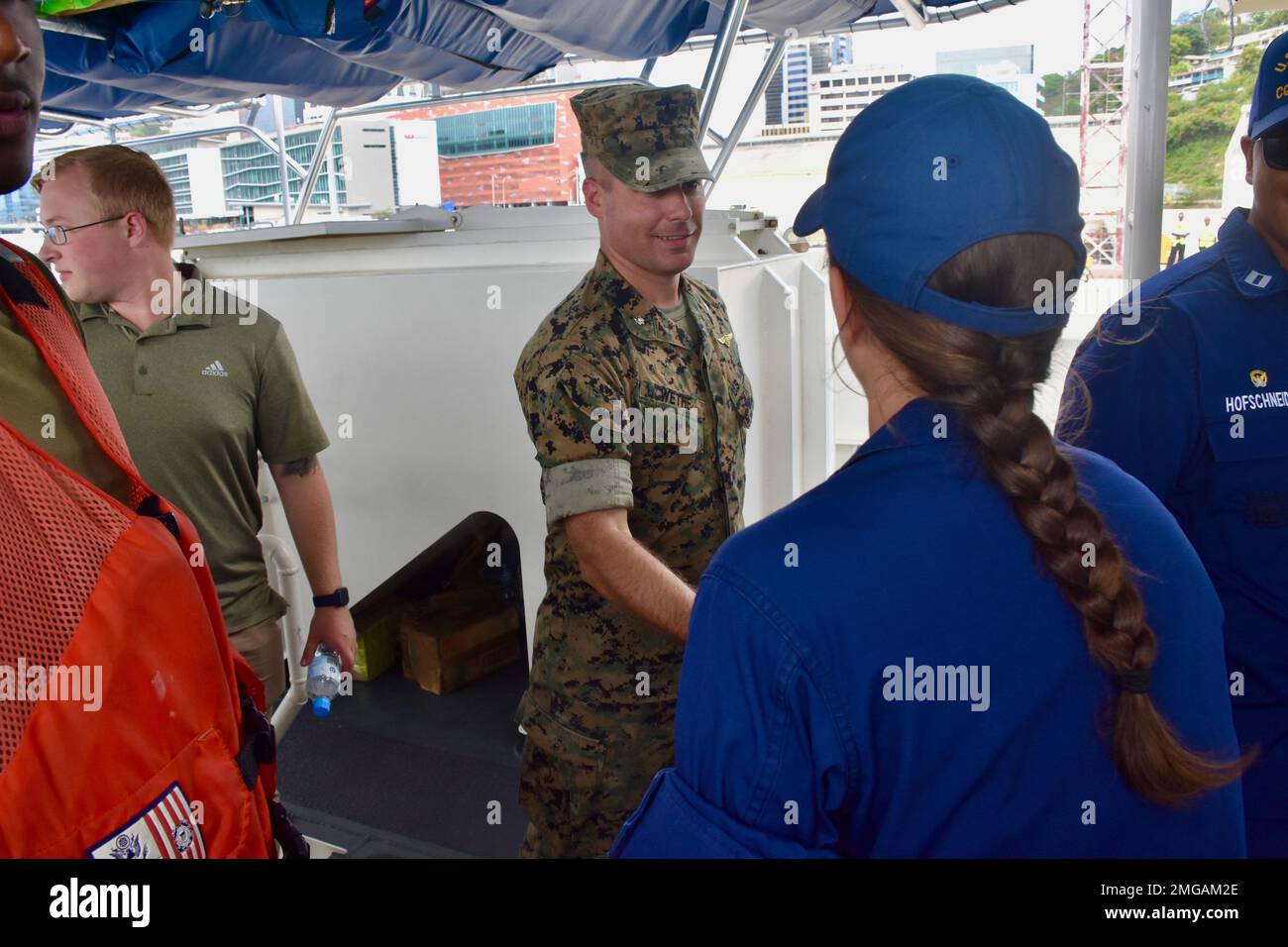 Lt. Col. Karl Wethe, defense attache in Port Moresby greets the ...
