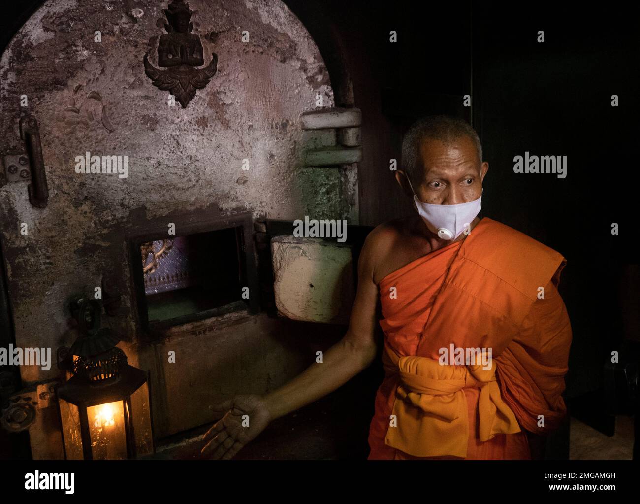 A Buddhist monk talks to media after putting the coffin of the infamous ...