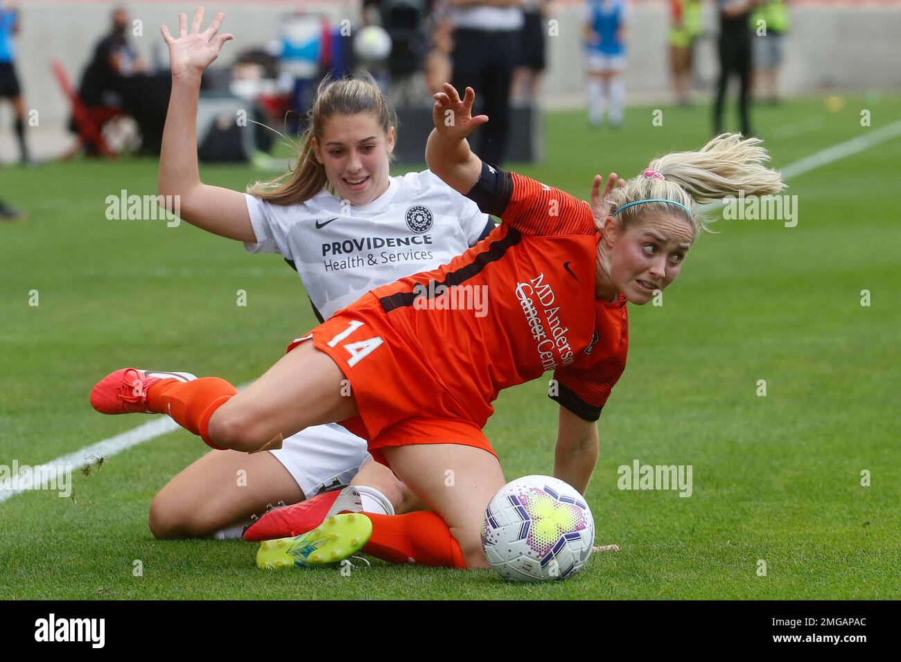 Portland Thorns' forward Morgan Weaver, rear, defends against Houston ...