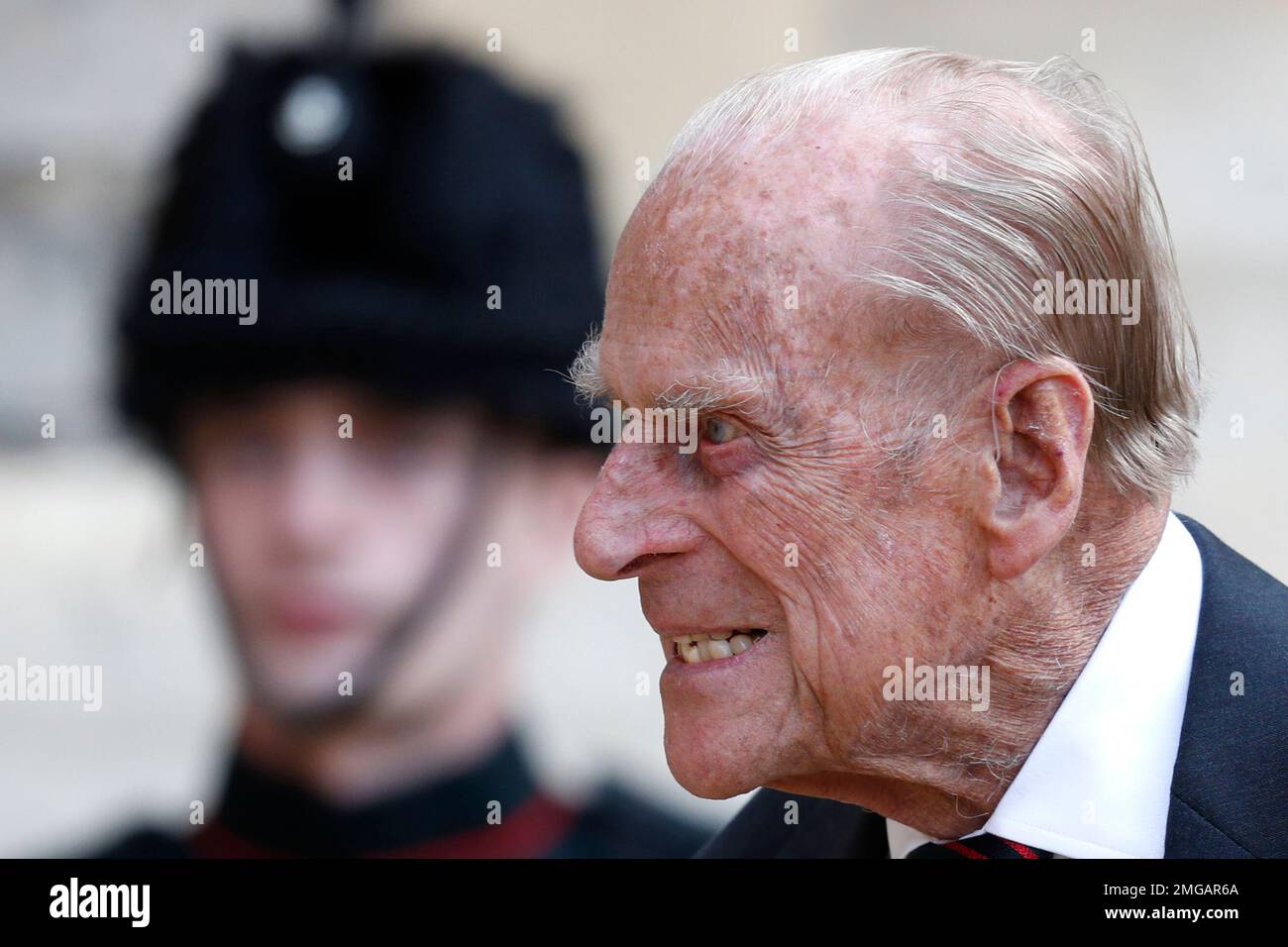 Britain's Prince Philip Duke of Edinburgh, centre, flanked by Assistant ...