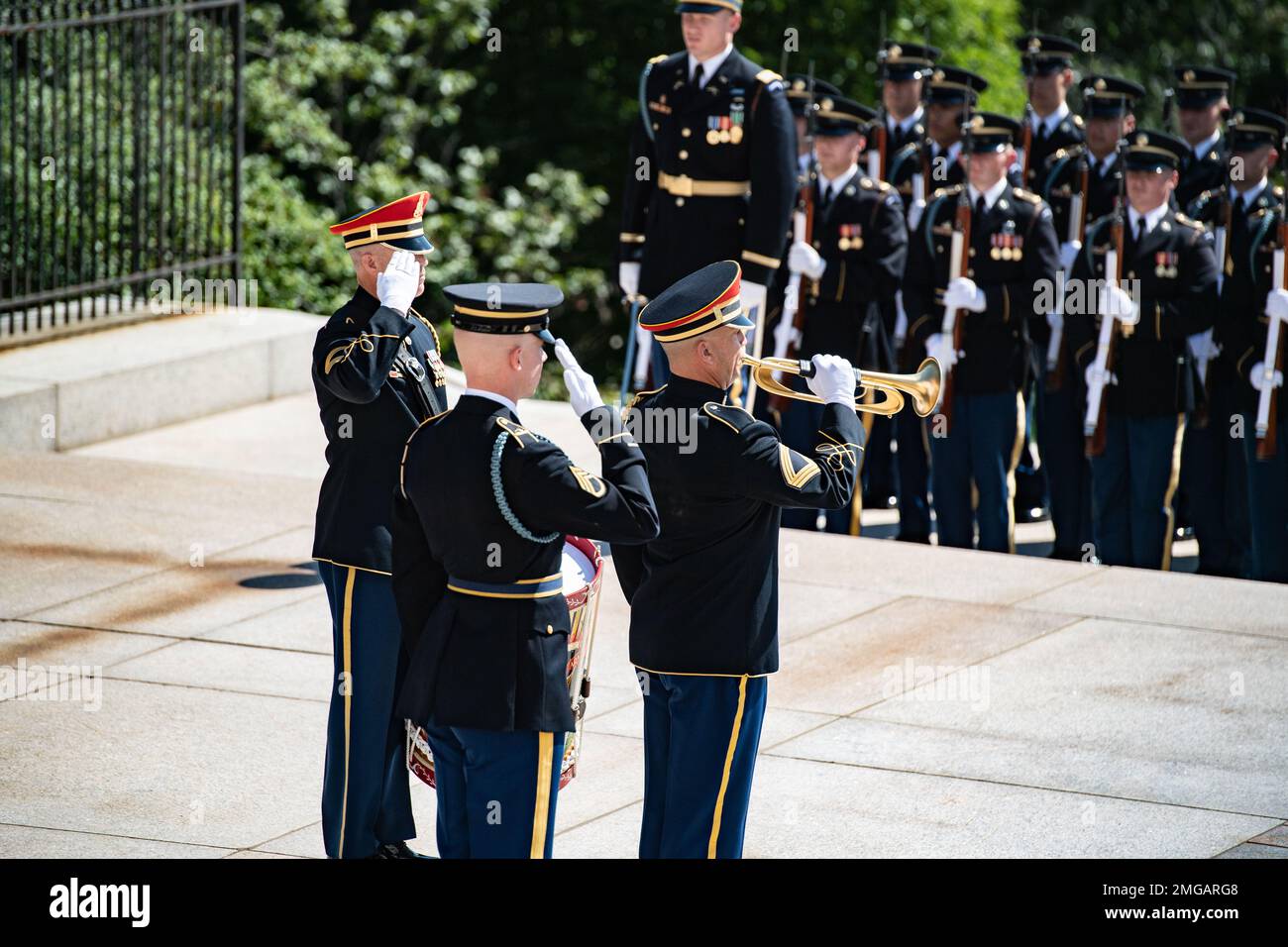A bugler from the U.S. Army Band, "Pershing's Own" plays "Taps" during ...