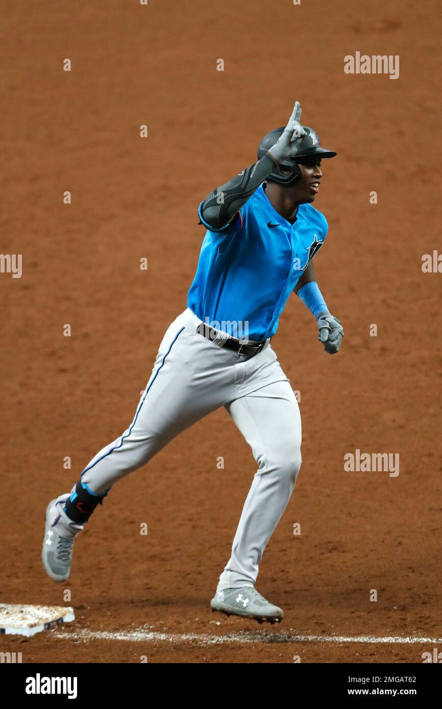 Miami Marlins Jesus Sanchez reacts as he rounds the bases after hitting ...