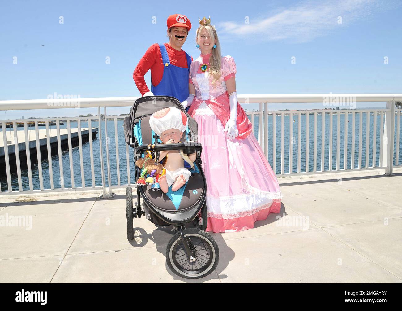 The Divis family, of Cleveland, dressed as Mario, Princess Peach and ...
