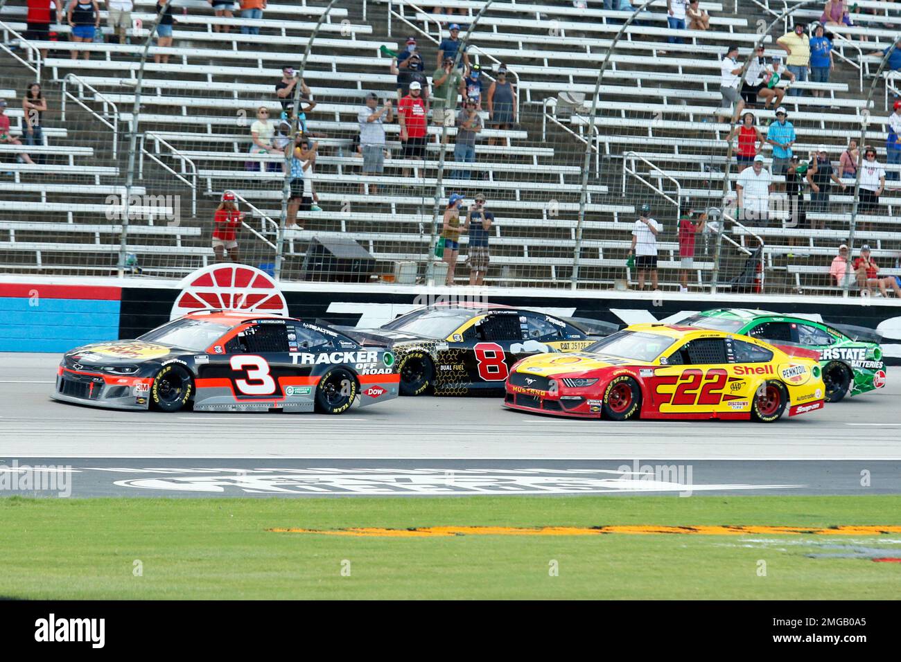 Austin Dillon (3) leads Tyler Reddick (8) and Joey Logano (22) on a ...