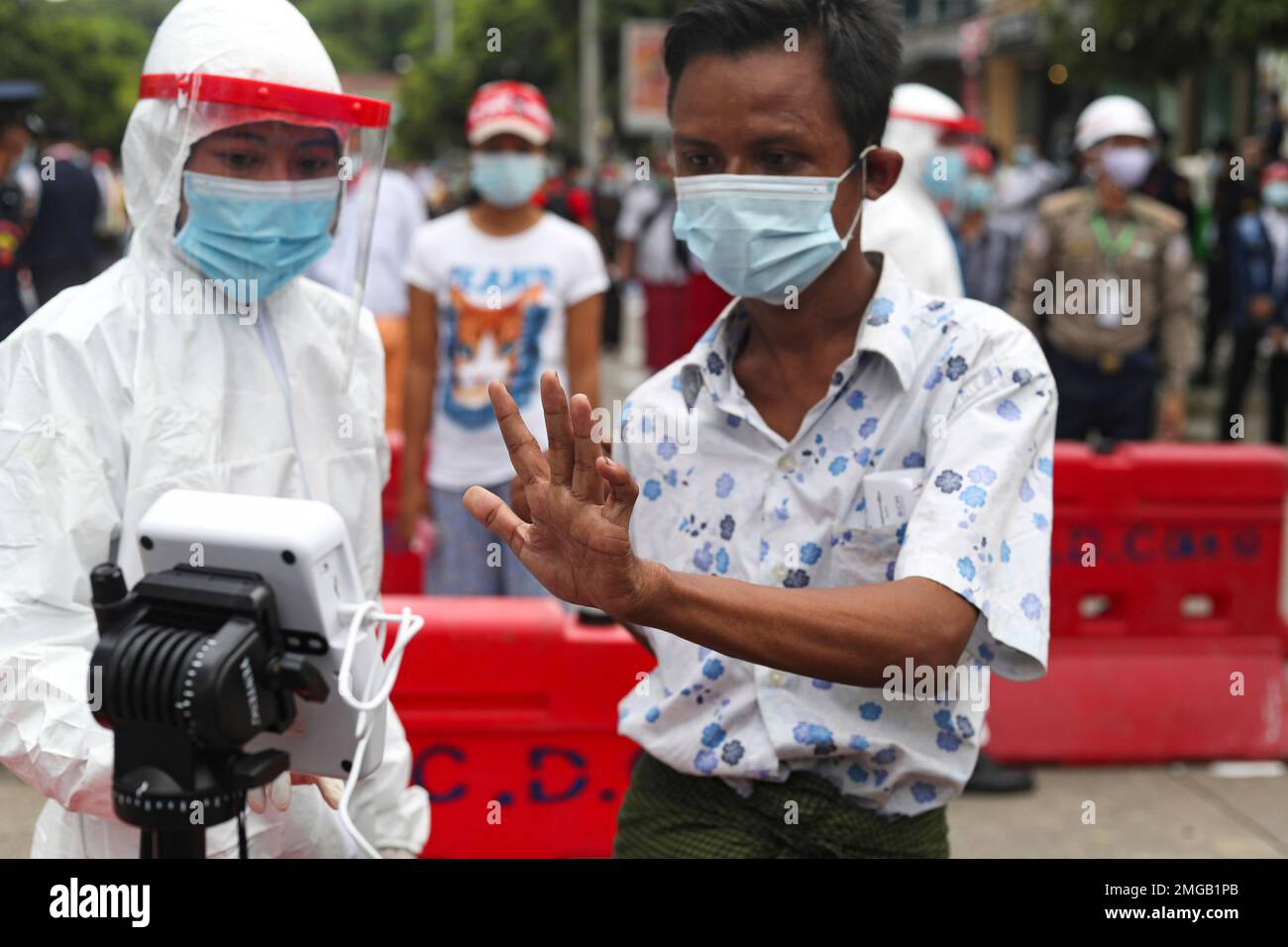 A man goes through medical checking place before saluting at the ...
