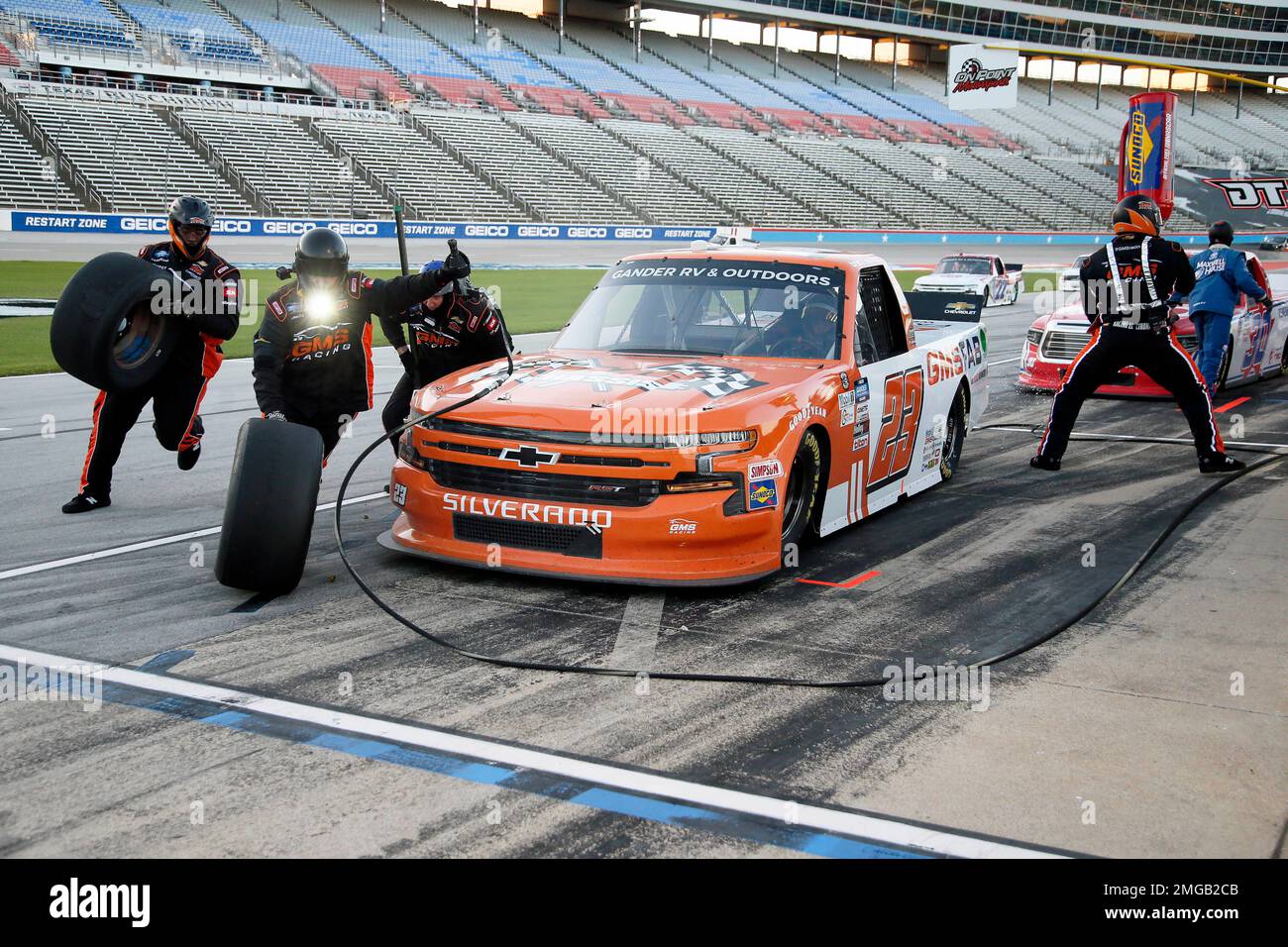 Brett Moffitt makes a pit stop during the NASCAR Trucks race at Texas ...