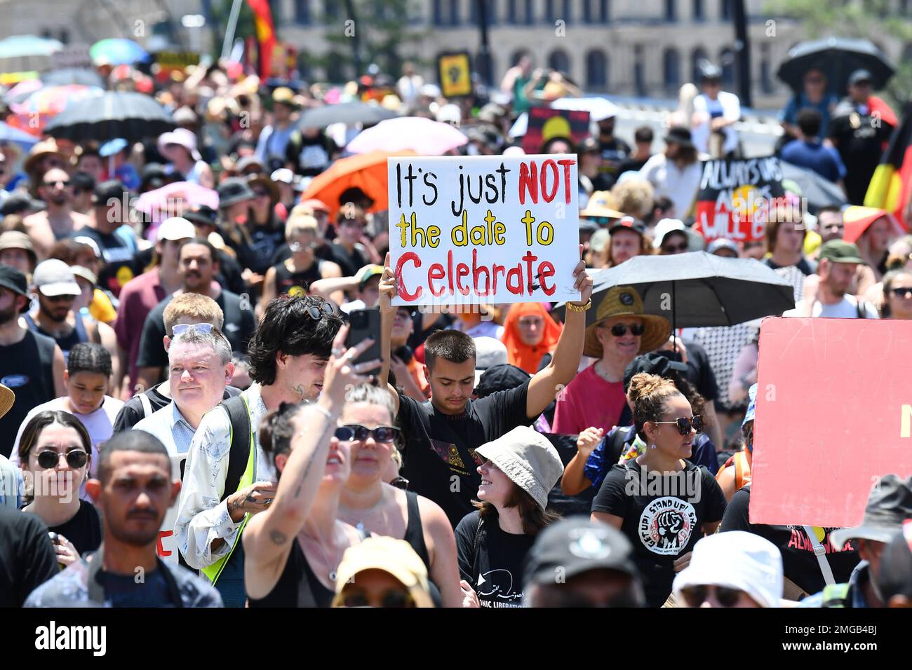 People march during an Invasion Day rally in Brisbane, Thursday ...