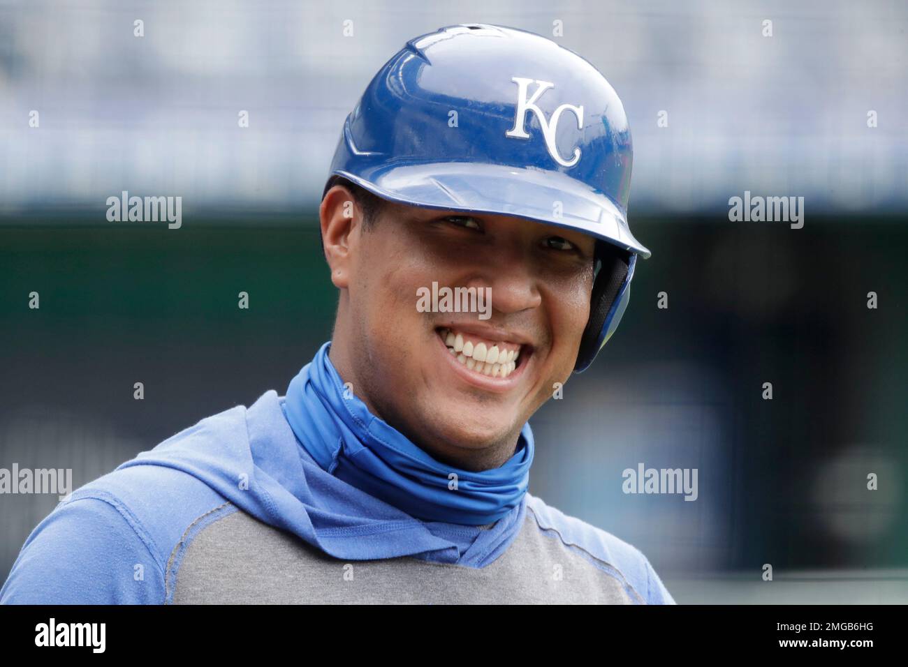 Kansas City Royals' Salvador Perez smiles at a teammate during baseball ...