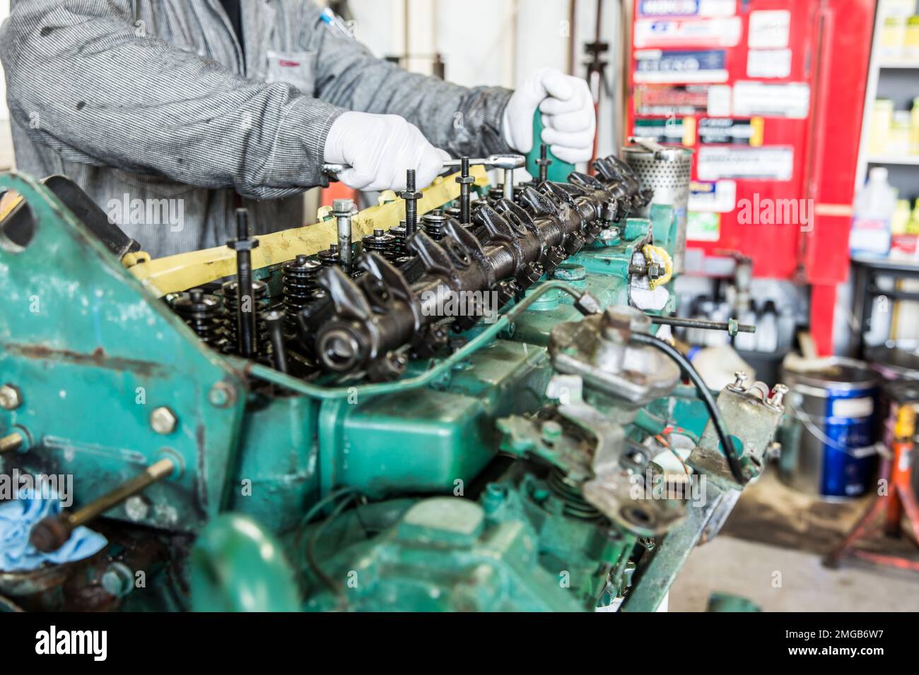 Japanese factory doing marine engine repair overhaul Stock Photo - Alamy